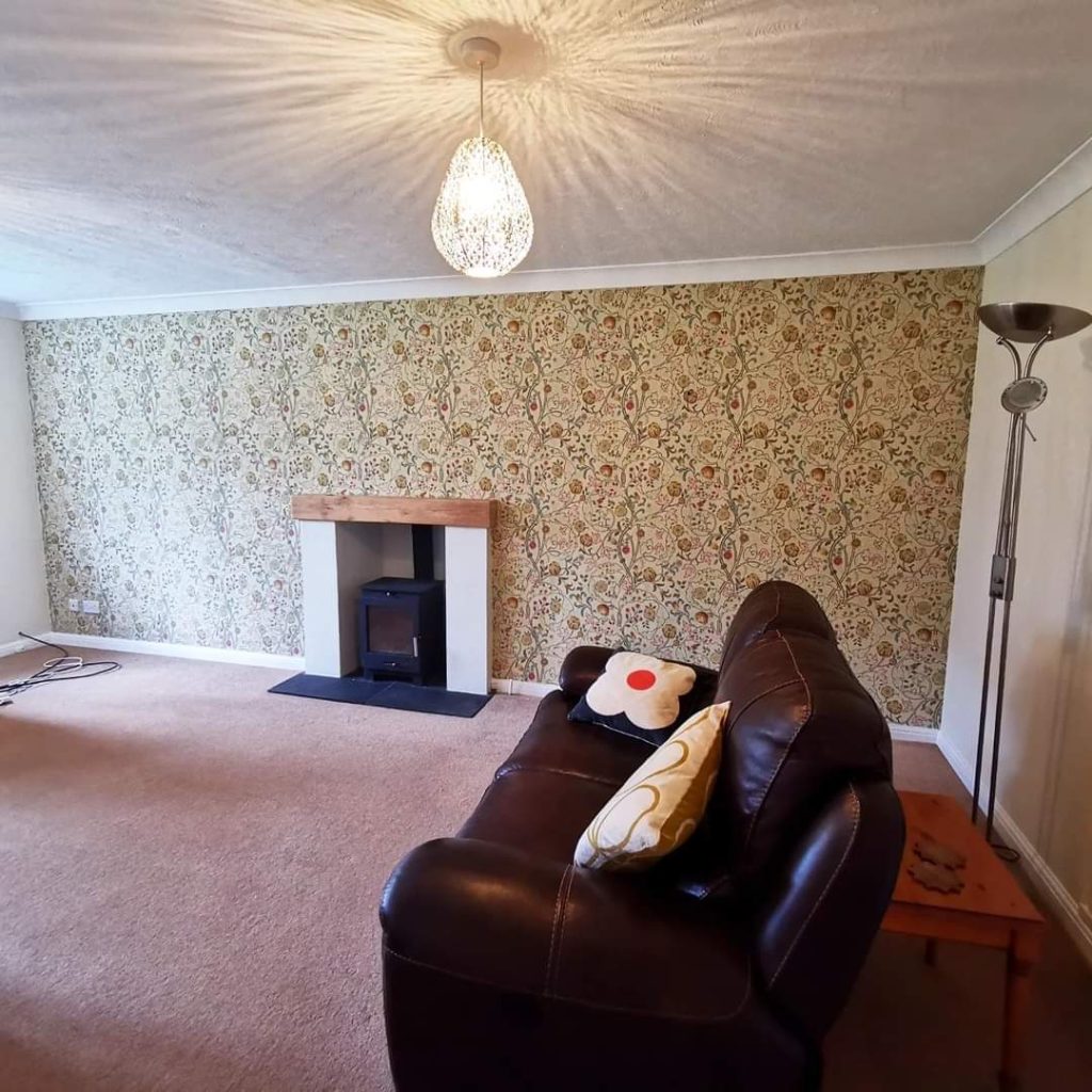 Cream Lounge with a Papered Feature Wall